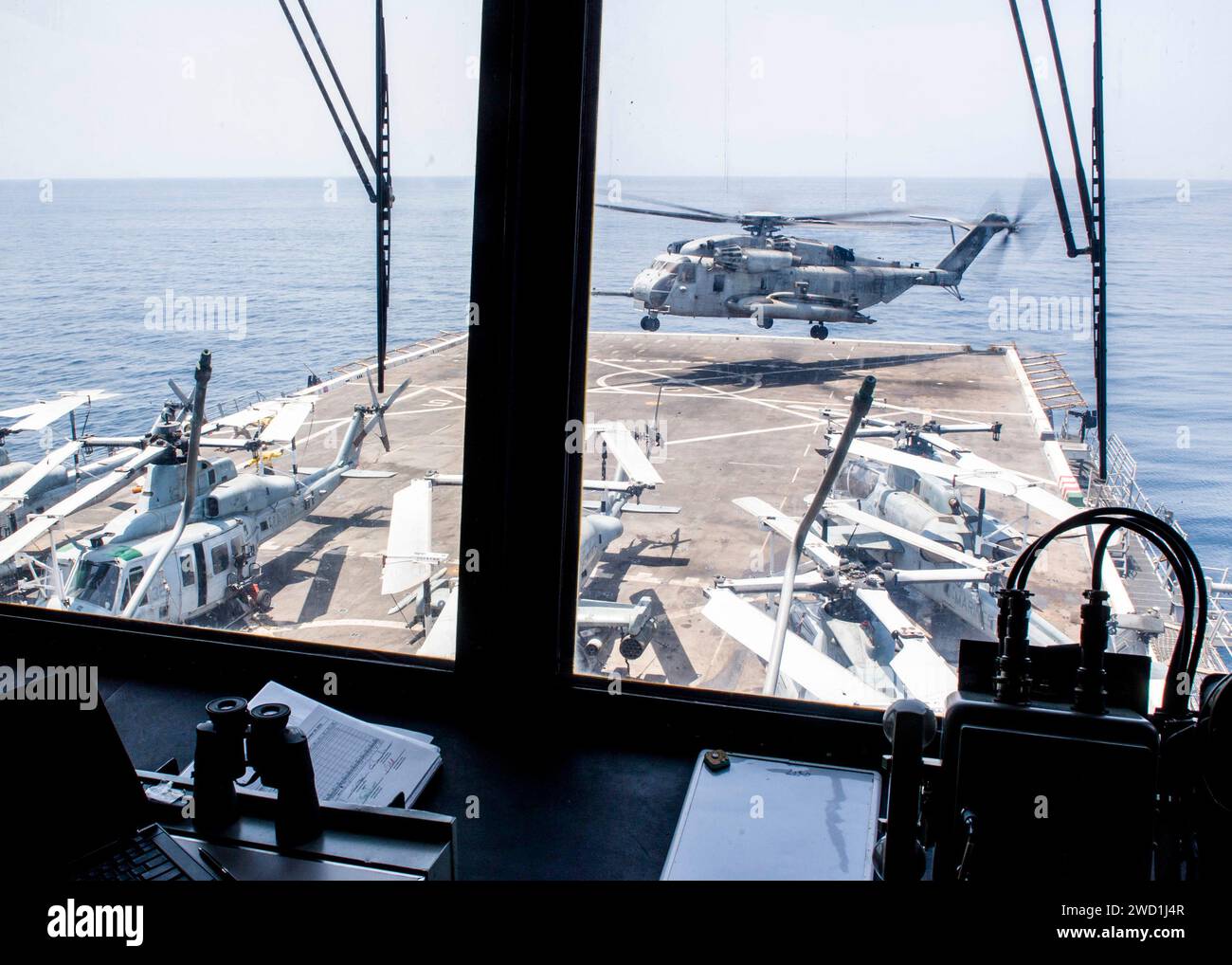 A U.S. Marine Corps CH-53E Sea Dragon helicopter launches from the ...