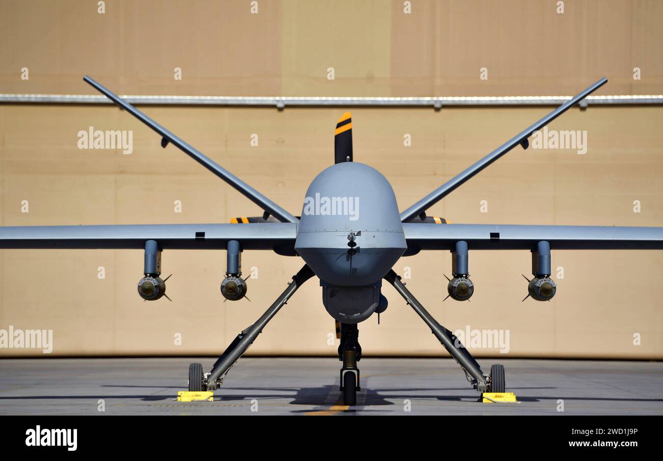 A U.S. Air Force MQ-9 Reaper armed with four GBU-38 Joint Direct Attack ...