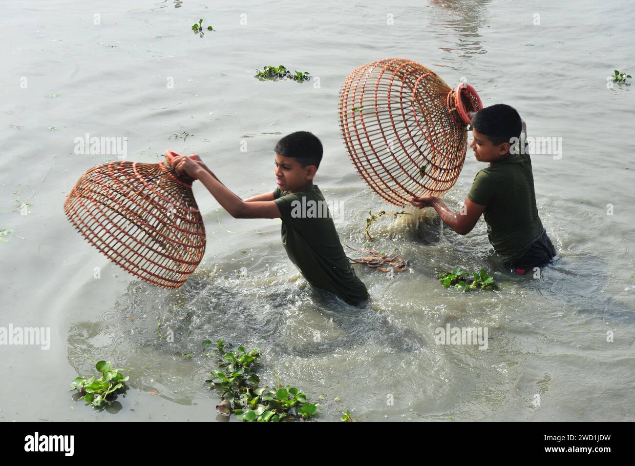 Bangladeshi villagers fishing hi-res stock photography and images - Alamy