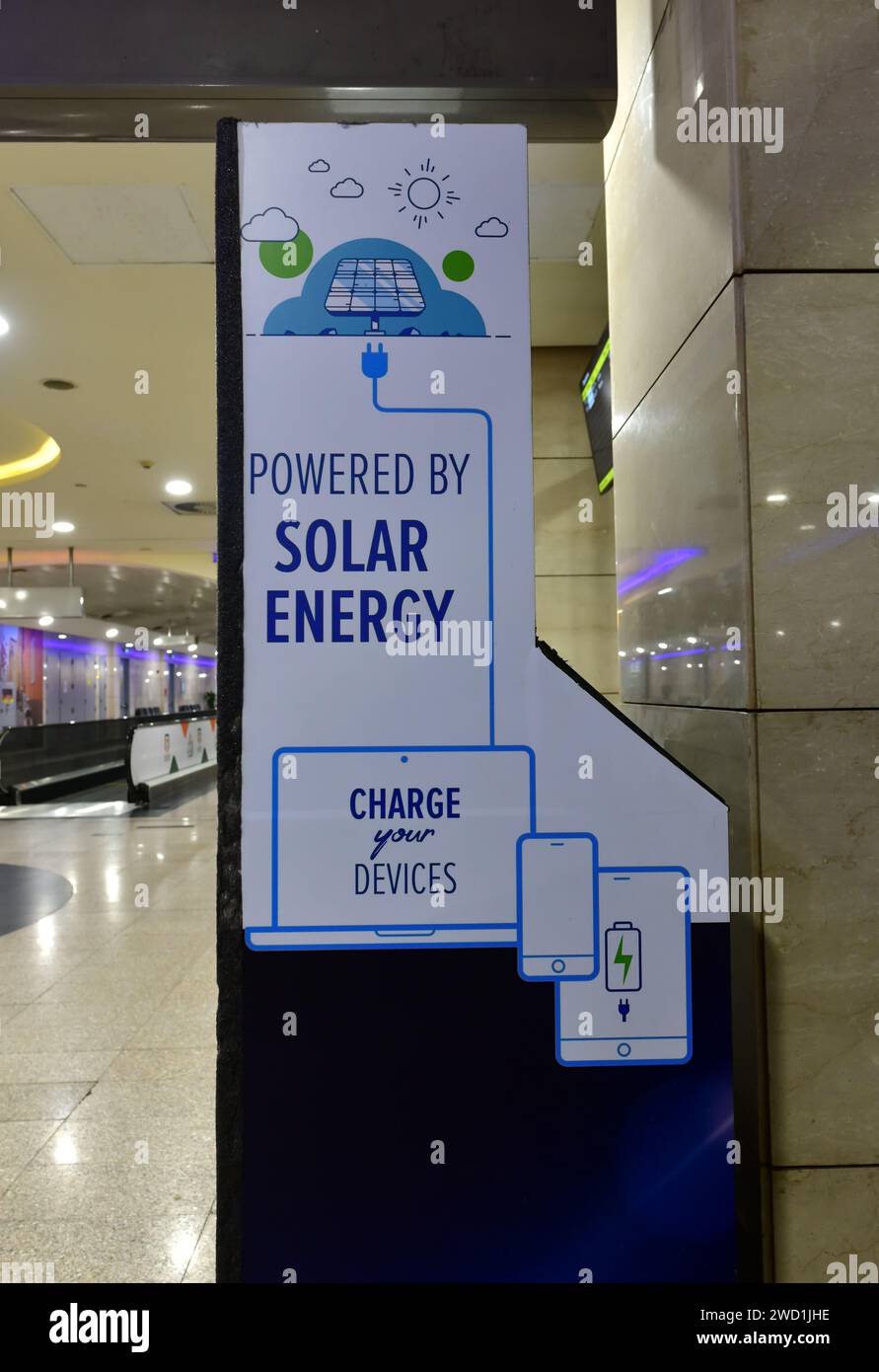 Solar-powered station for charging mobile phones. Cairo Airport Stock ...