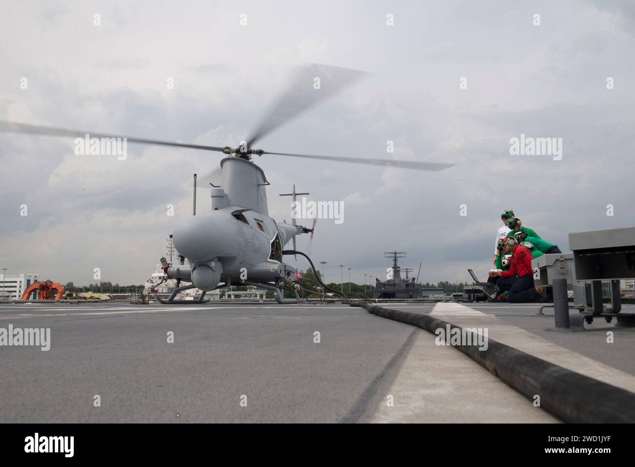 Sailors perform functional tests on an MQ-8B Fire Scout unmanned ...