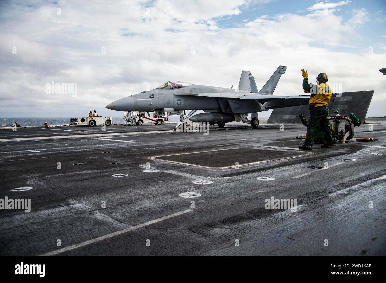 An F/A-18E Super Hornet prepares to launch from USS Dwight D ...