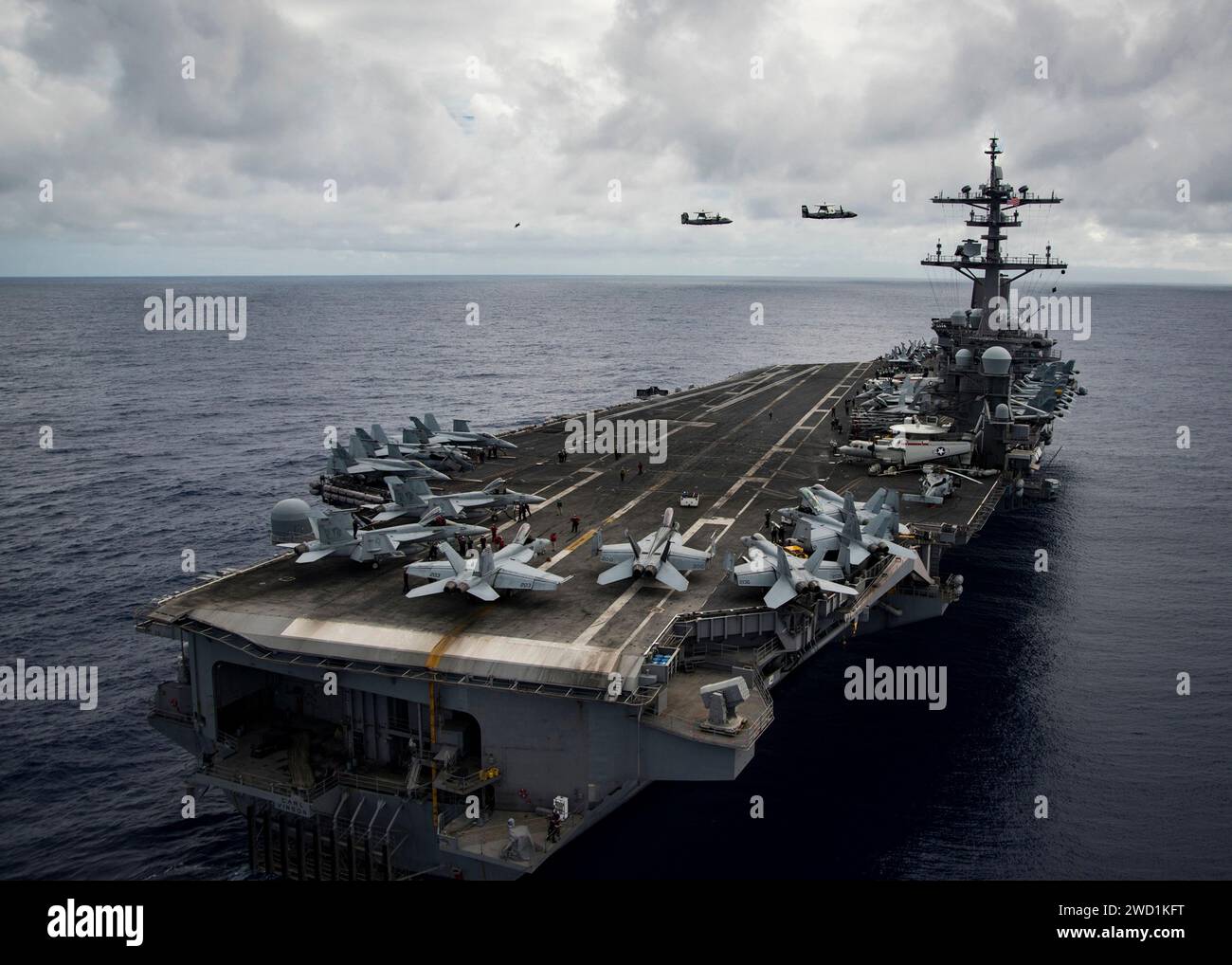 Two E-2C Hawkeye early warning and control aircraft fly over the ...