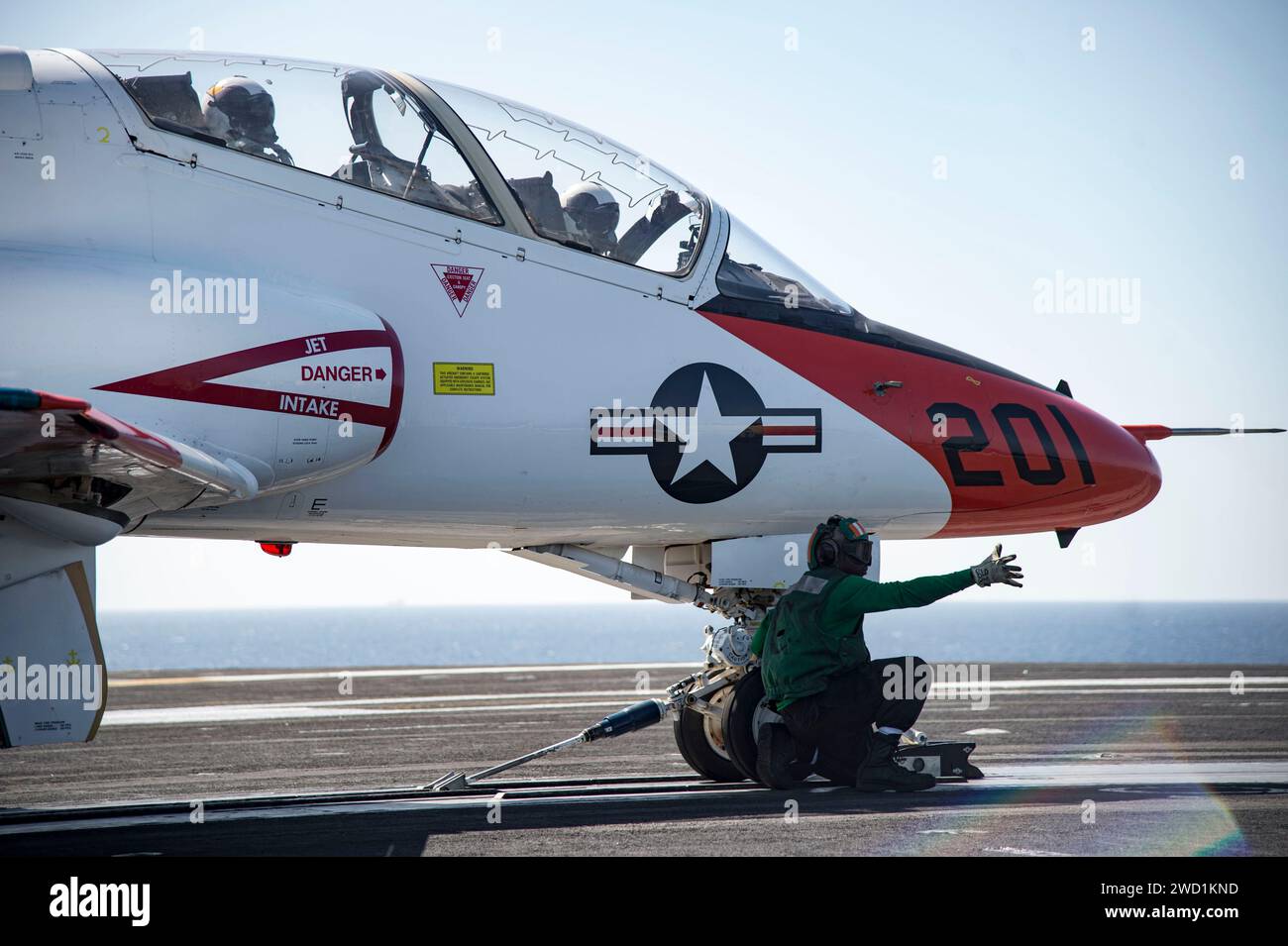 A T-45C Goshawk training aircraft undergoes preflight checks Stock ...