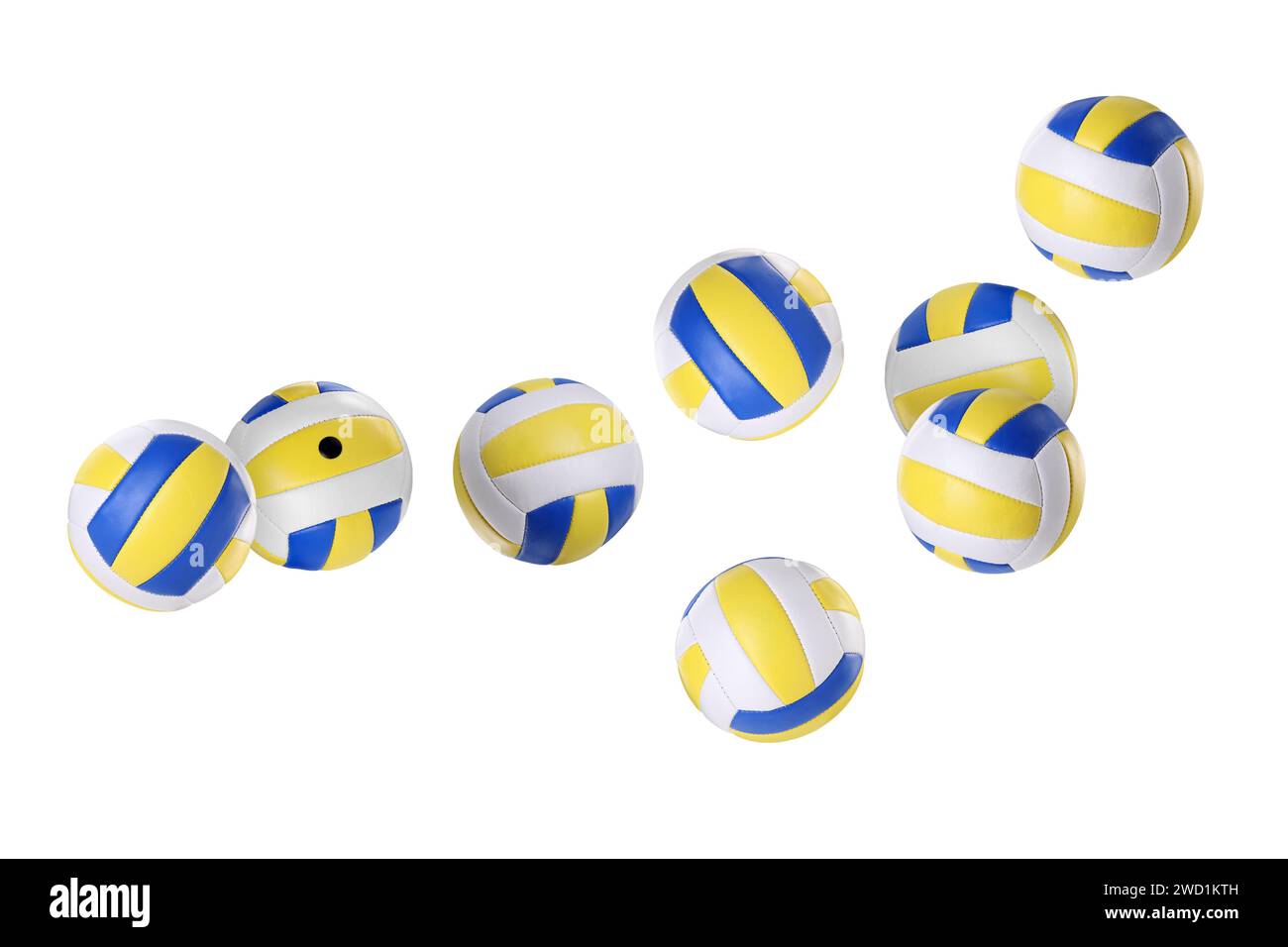 Many volleyball balls flying on white background Stock Photo - Alamy