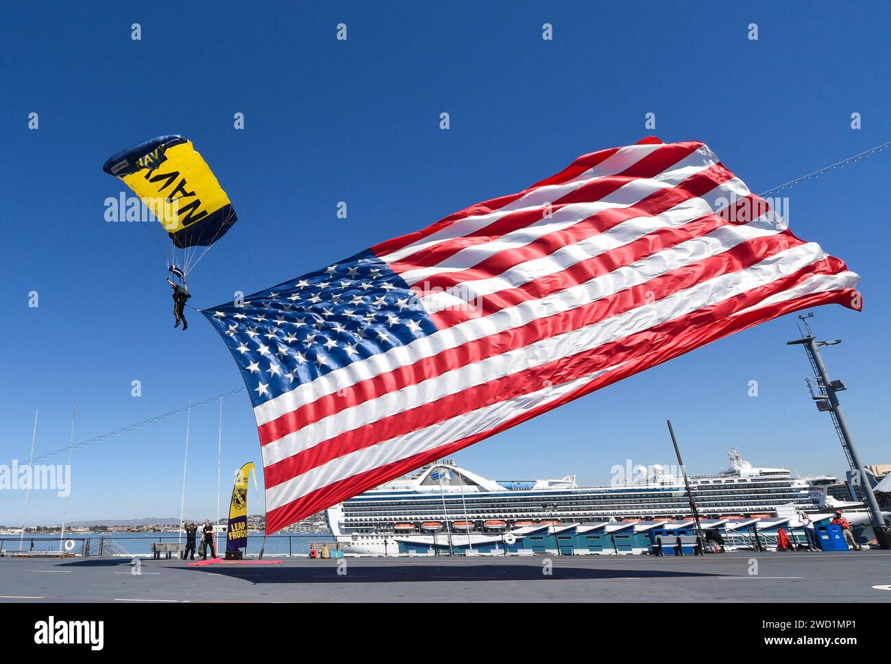 A member of the U.S. Navy Parachute Team, the Leap Frogs, landing on ...