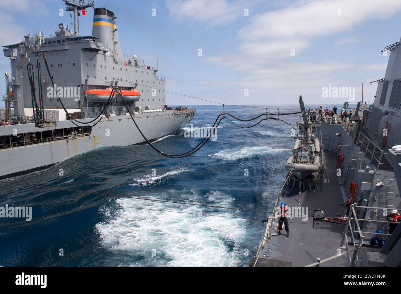 Replenishment-at-sea between guided-missile destroyer USS Sterett and ...