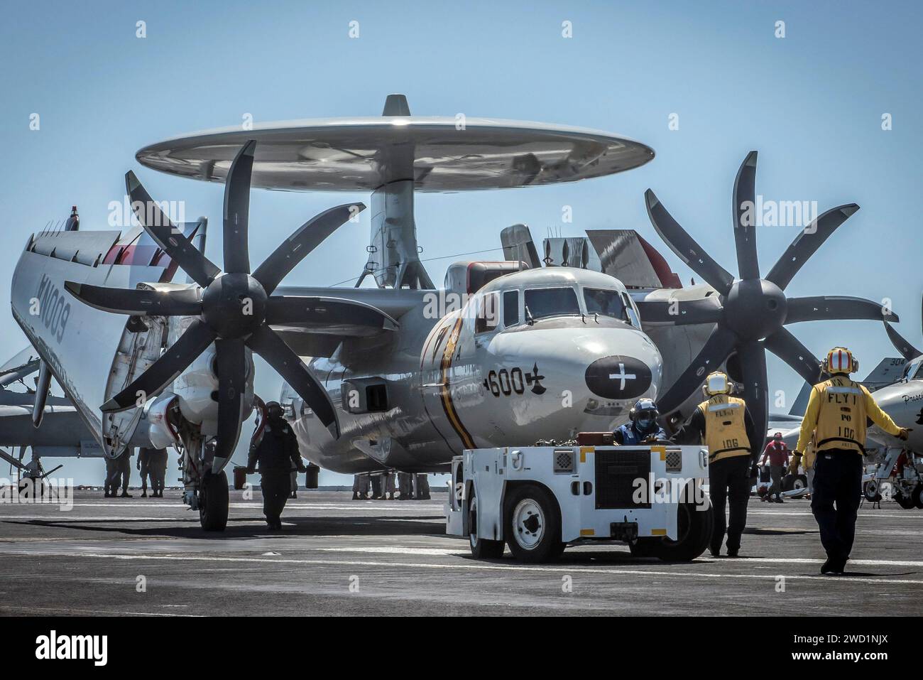 Sailors taxi an E-2C Hawkeye for takeoff on the flight deck of USS ...