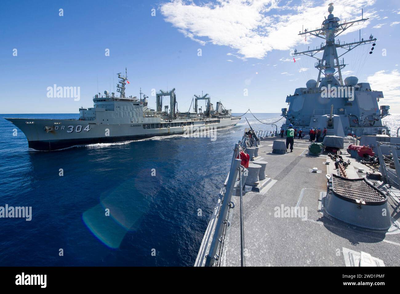 USS Sterett conducts a force replenishment-at-sea with the Royal ...