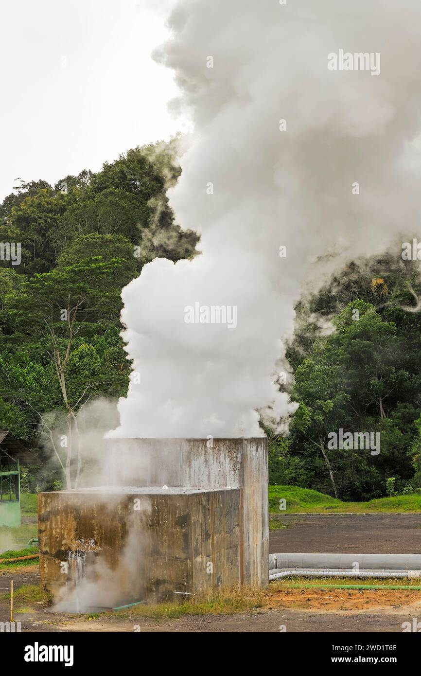 Steam chimneys at a volcanic power plant run by Pertamina Geothermal ...
