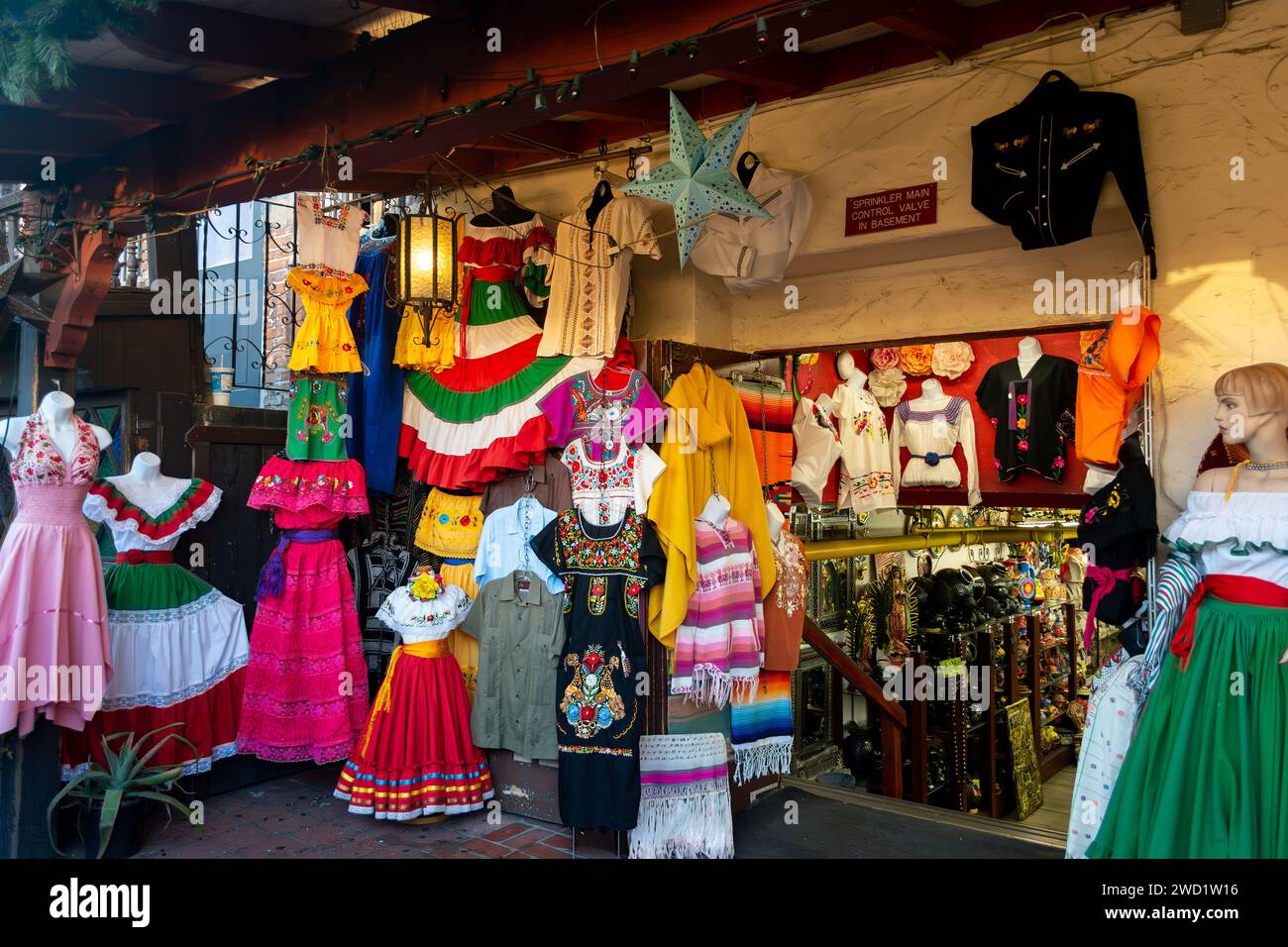The vibrant clothes in the market on Olvera Street in Los Angeles ...