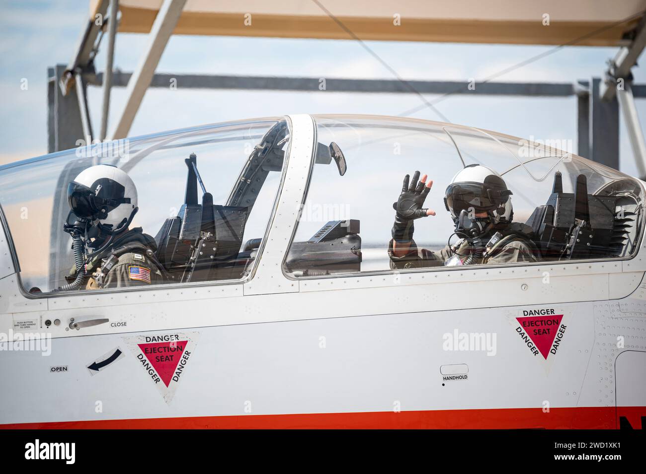 Co-pilot waves from the cockpit of a T-6 Texan II Stock Photo - Alamy
