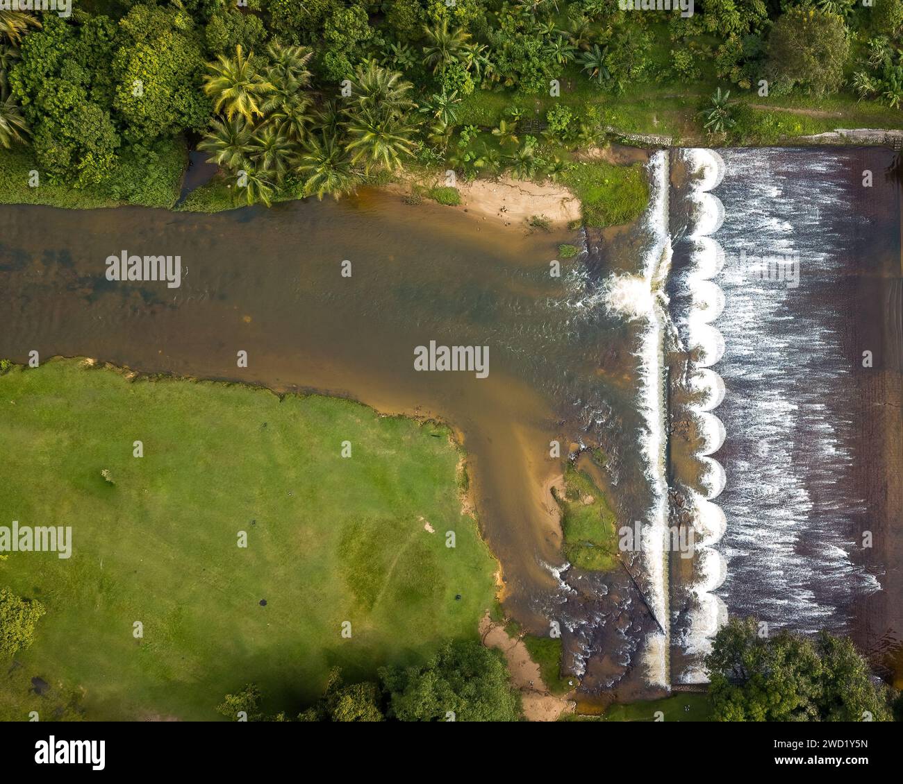 Aerial view of the water flowing from the stream to the dam in Malaysia ...