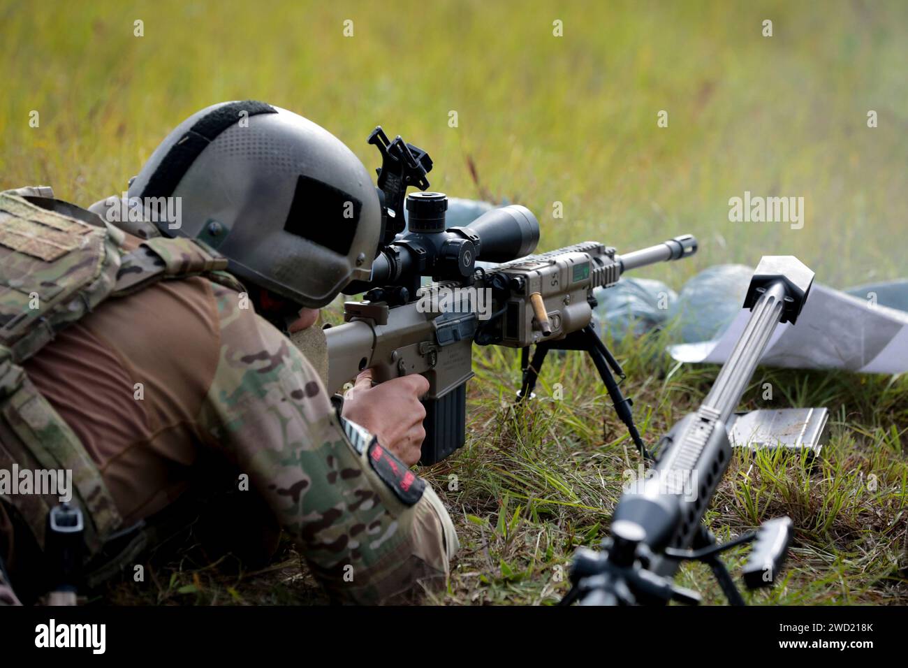 Sniper firing his rifle Stock Photo - Alamy