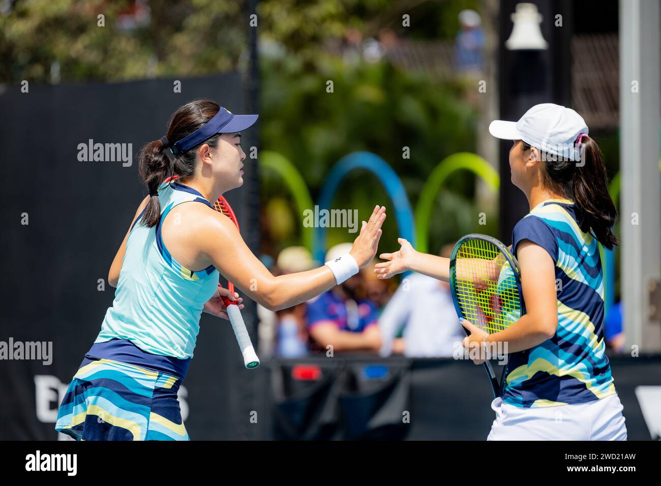 Melbourne, Australia. 18th Jan, 2024. Zhu Lin (L) celebrates with Wu ...