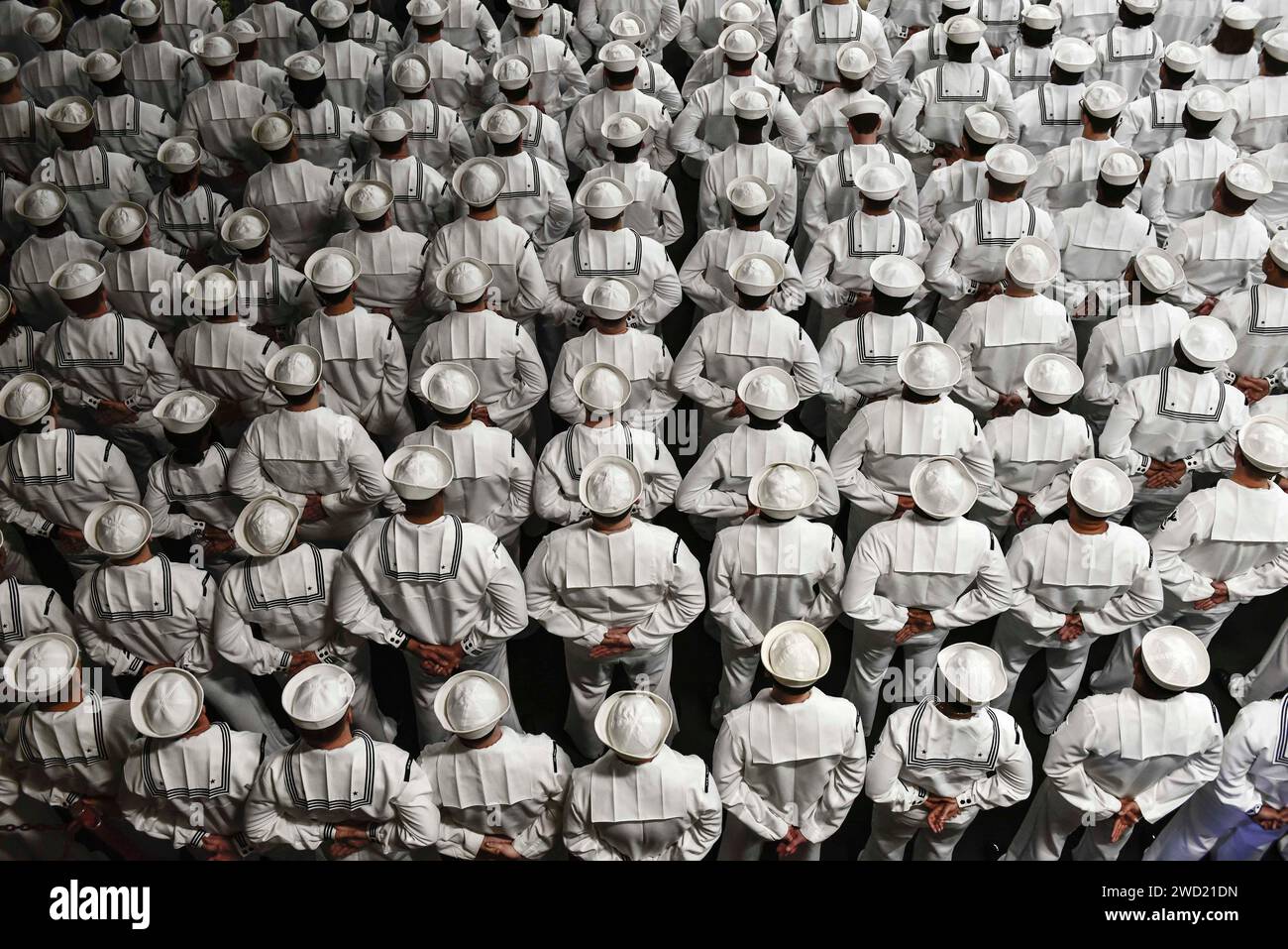 U.S. Sailors stand at parade rest during a Change of Command ceremony ...