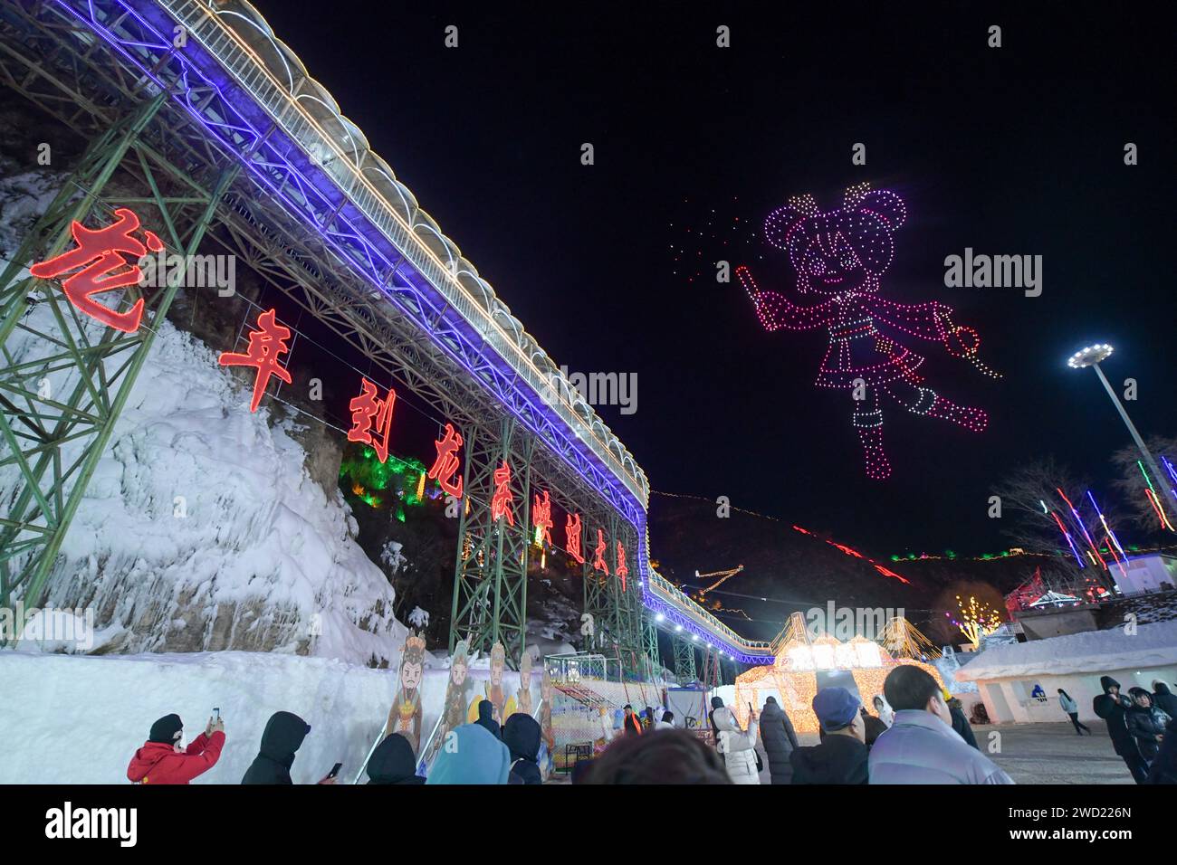 People have fun at the Longqingxia ice and snow carnival in Yanqing ...