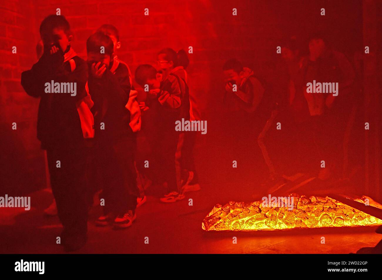 YANTAI, CHINA - JANUARY 18, 2024 - Students experience a smoke escape ...