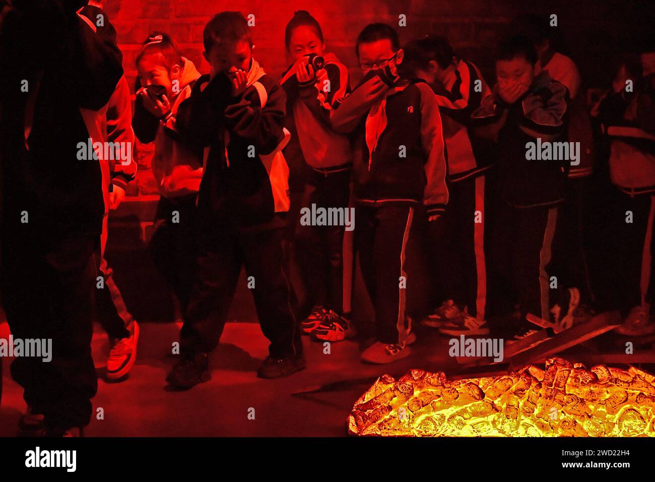 YANTAI, CHINA - JANUARY 18, 2024 - Students experience a smoke escape ...