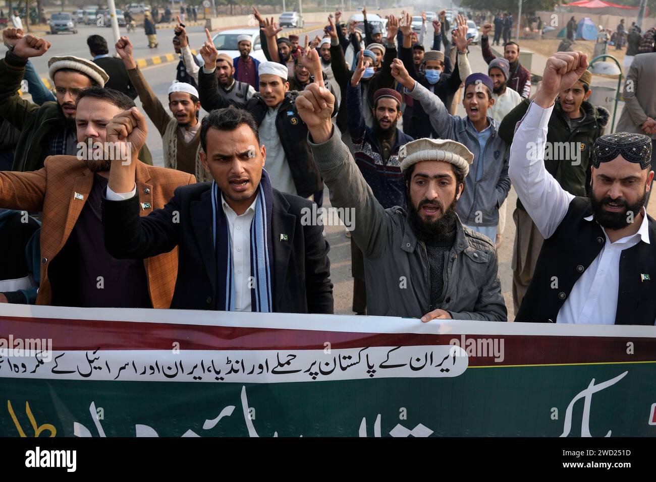 Members of Muslim Talba Mahaz Pakistan chant slogans at a demonstration ...