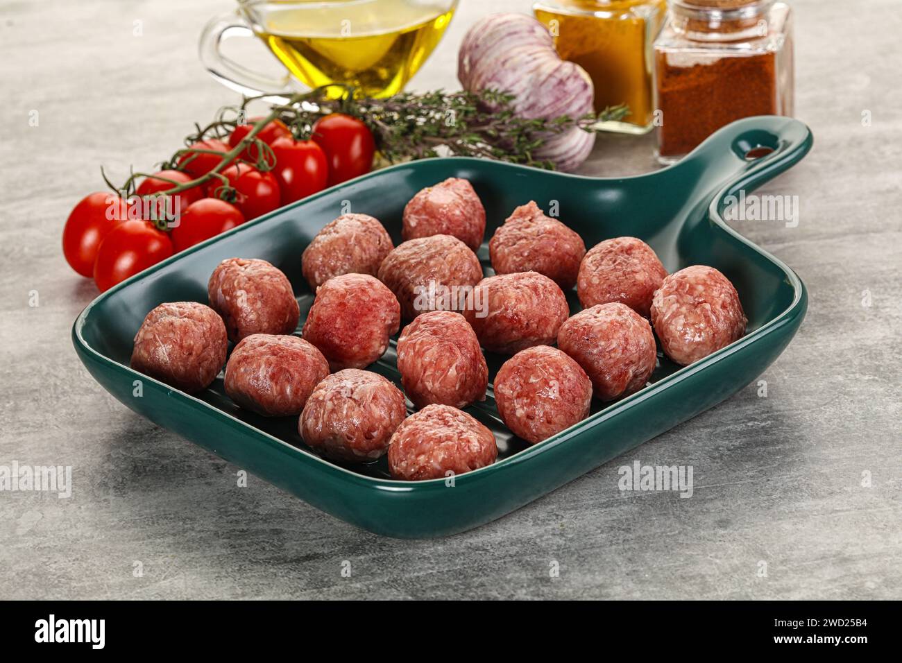 Uncooked raw beef meatball minced meat Stock Photo - Alamy