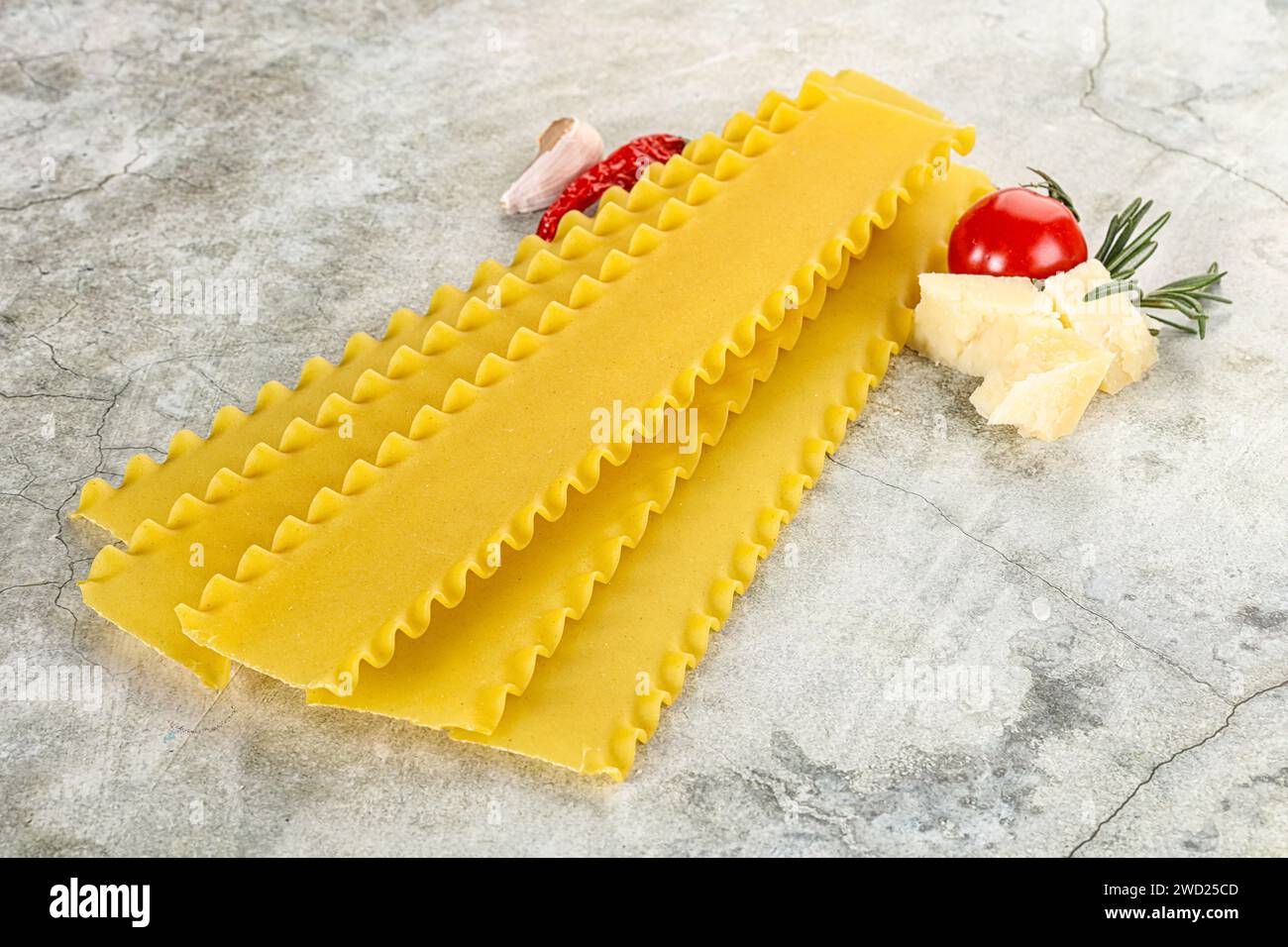 Uncooked raw Lasagna dry sheets for bake Stock Photo - Alamy