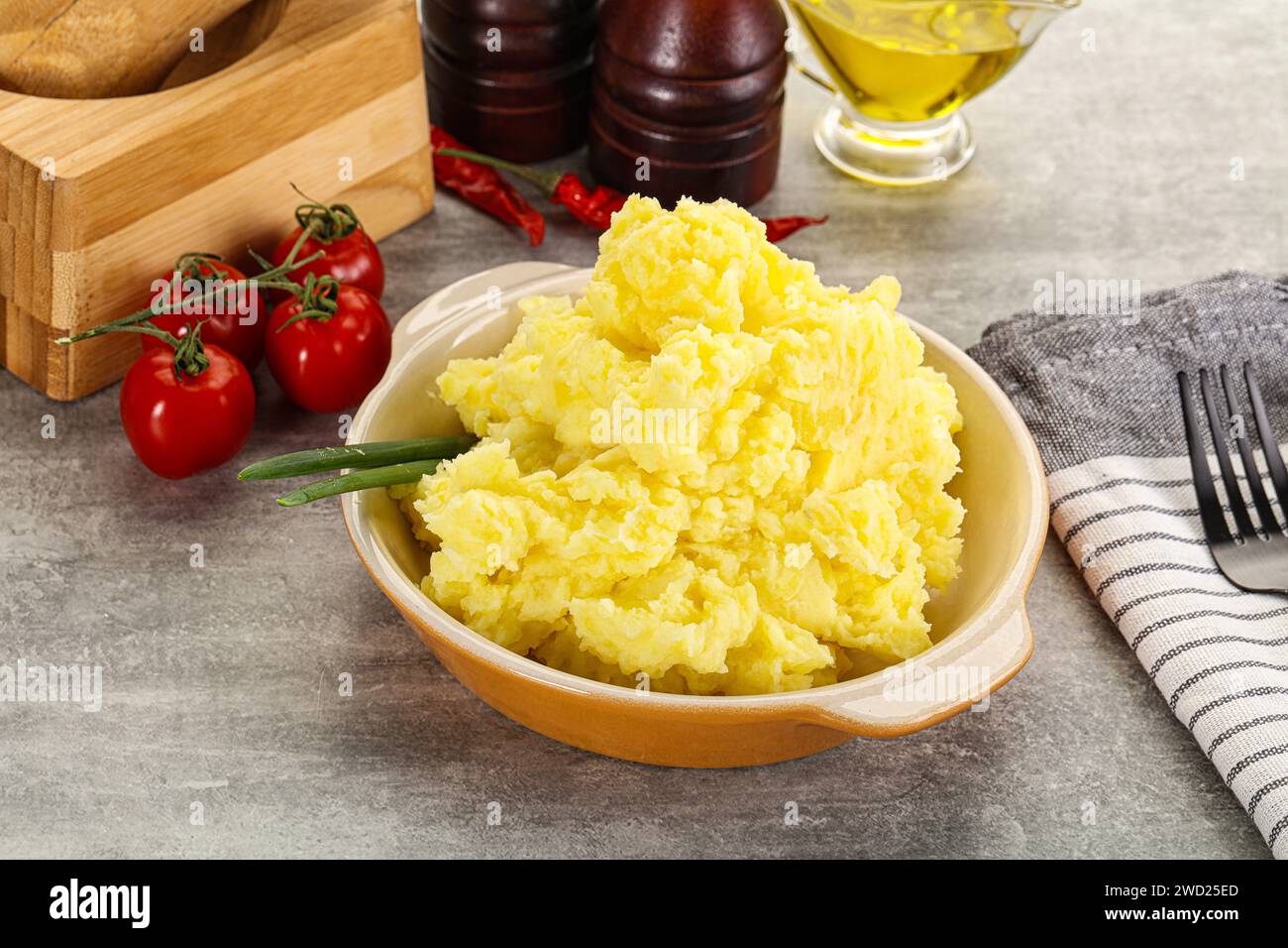 Mashed potato Puree with butter served green onion Stock Photo - Alamy