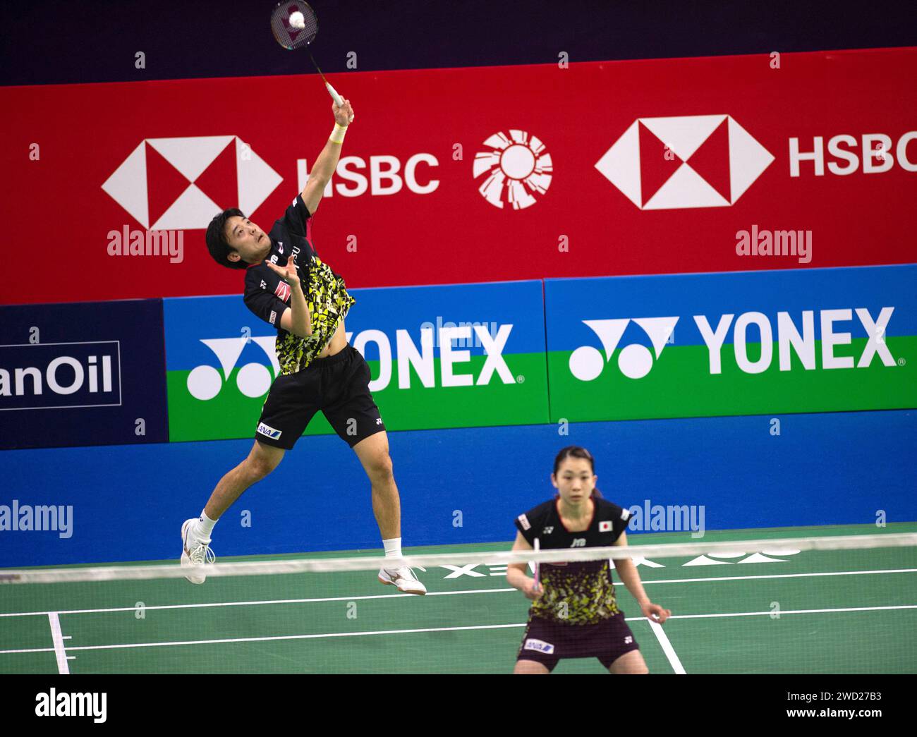 New Delhi, India. 18th Jan, 2024. Kaneko Yuki (L)/Matsutomo Misaki of Japan compete during the ...