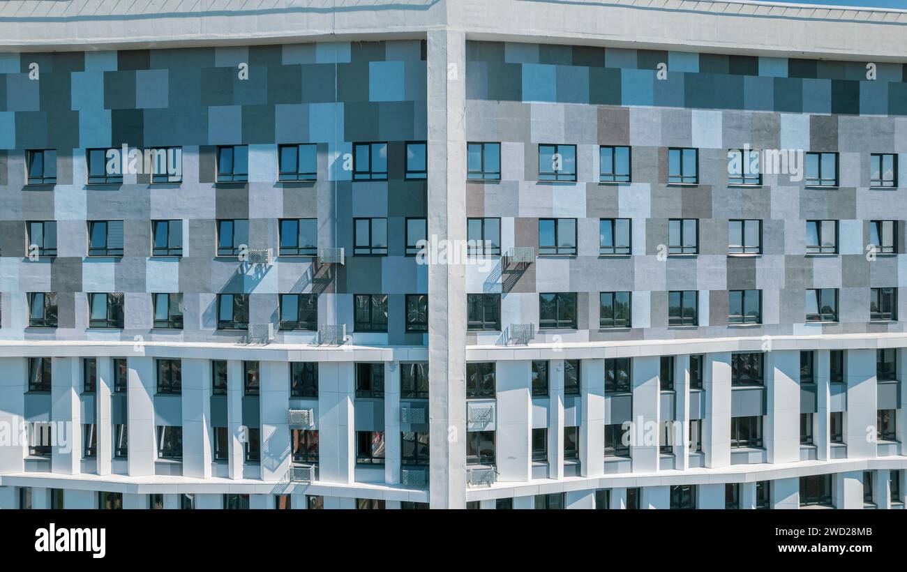 New building facade in housing complex. Modern style in architecture ...
