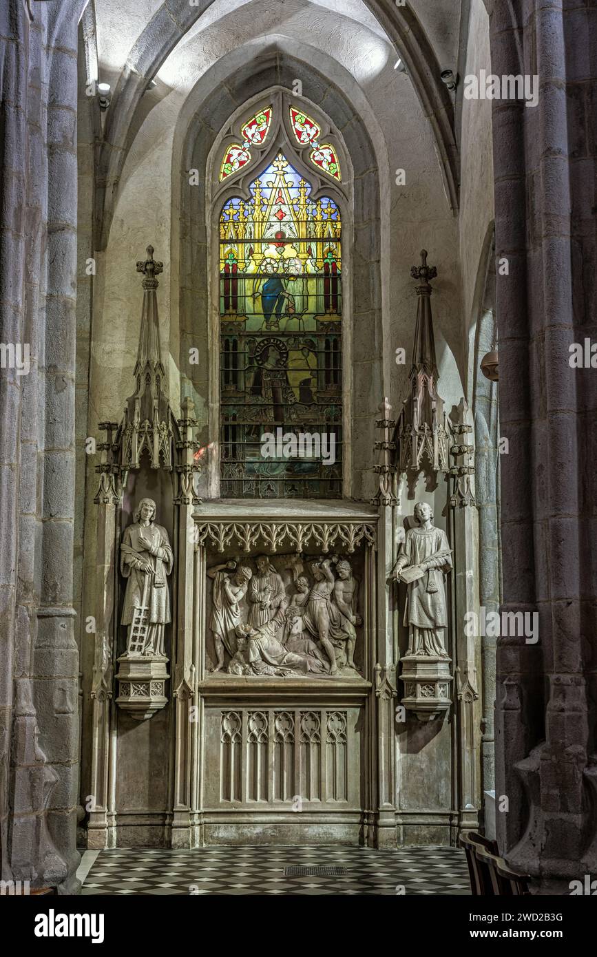 Stoning of Saint Stephen, stone bas-relief, flanked by two statues in ...