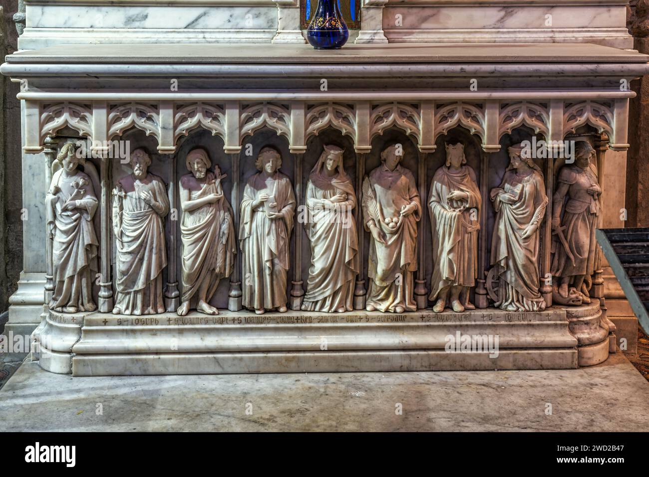 White marble bas-relief under the statue of the Virgin and Child by the ...