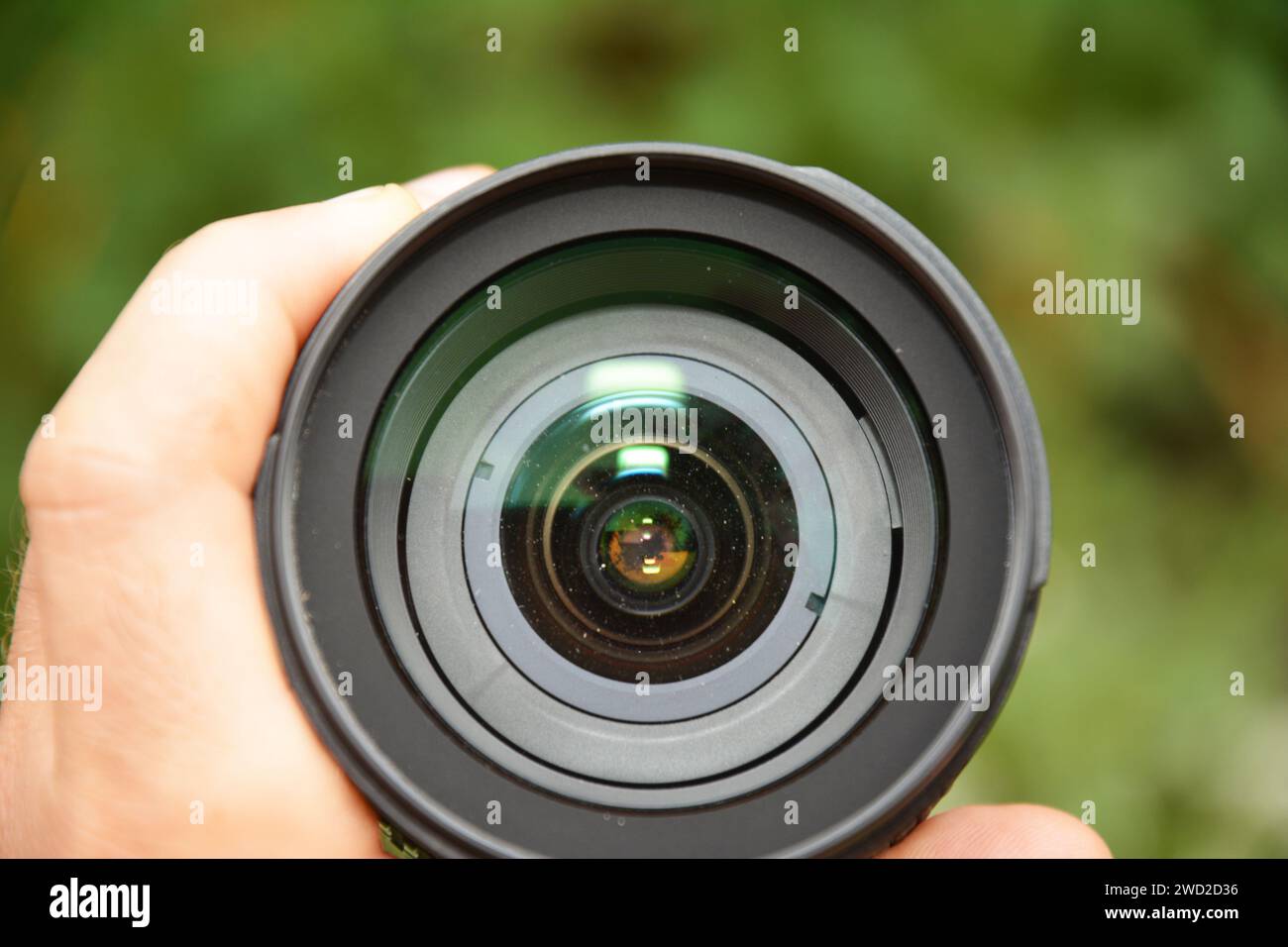 Dust inside lens. Cleaning Dust on Your DSLR Camera Lens Stock Photo ...