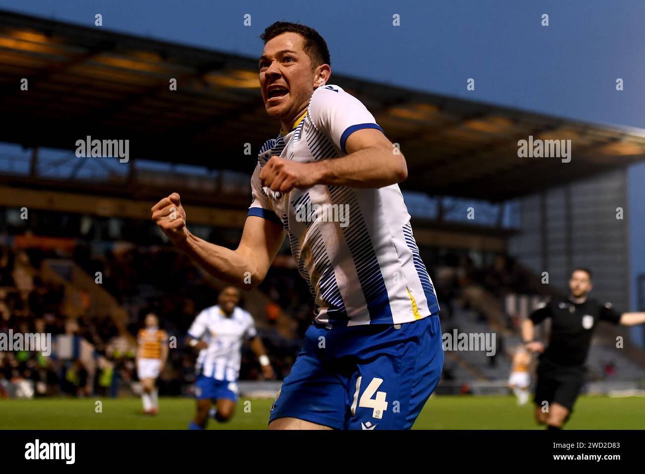 Tom Hopper of Colchester United celebrates scoring his sides first goal ...