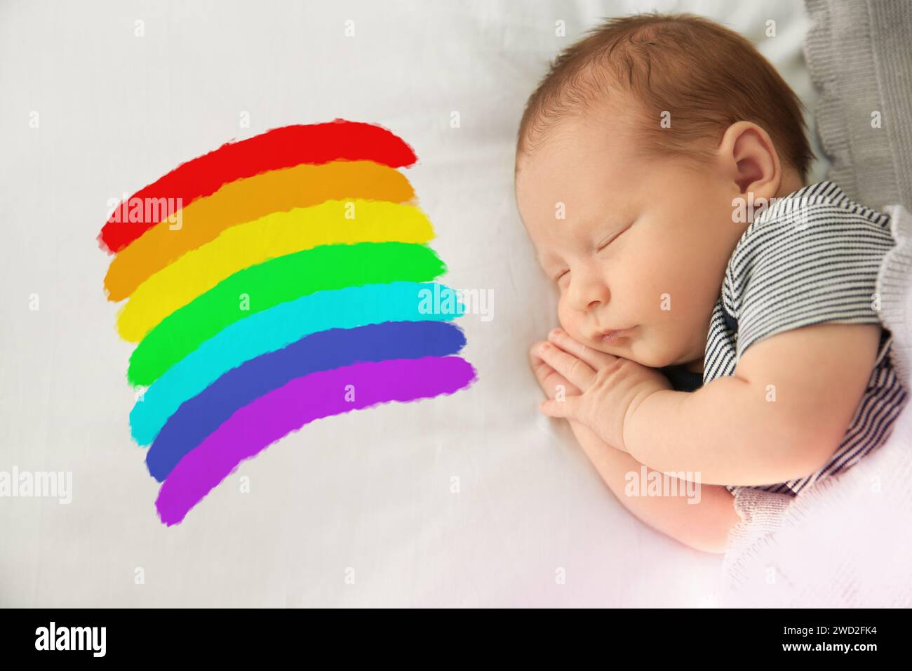 National rainbow baby day. Cute child sleeping in bed Stock Photo - Alamy