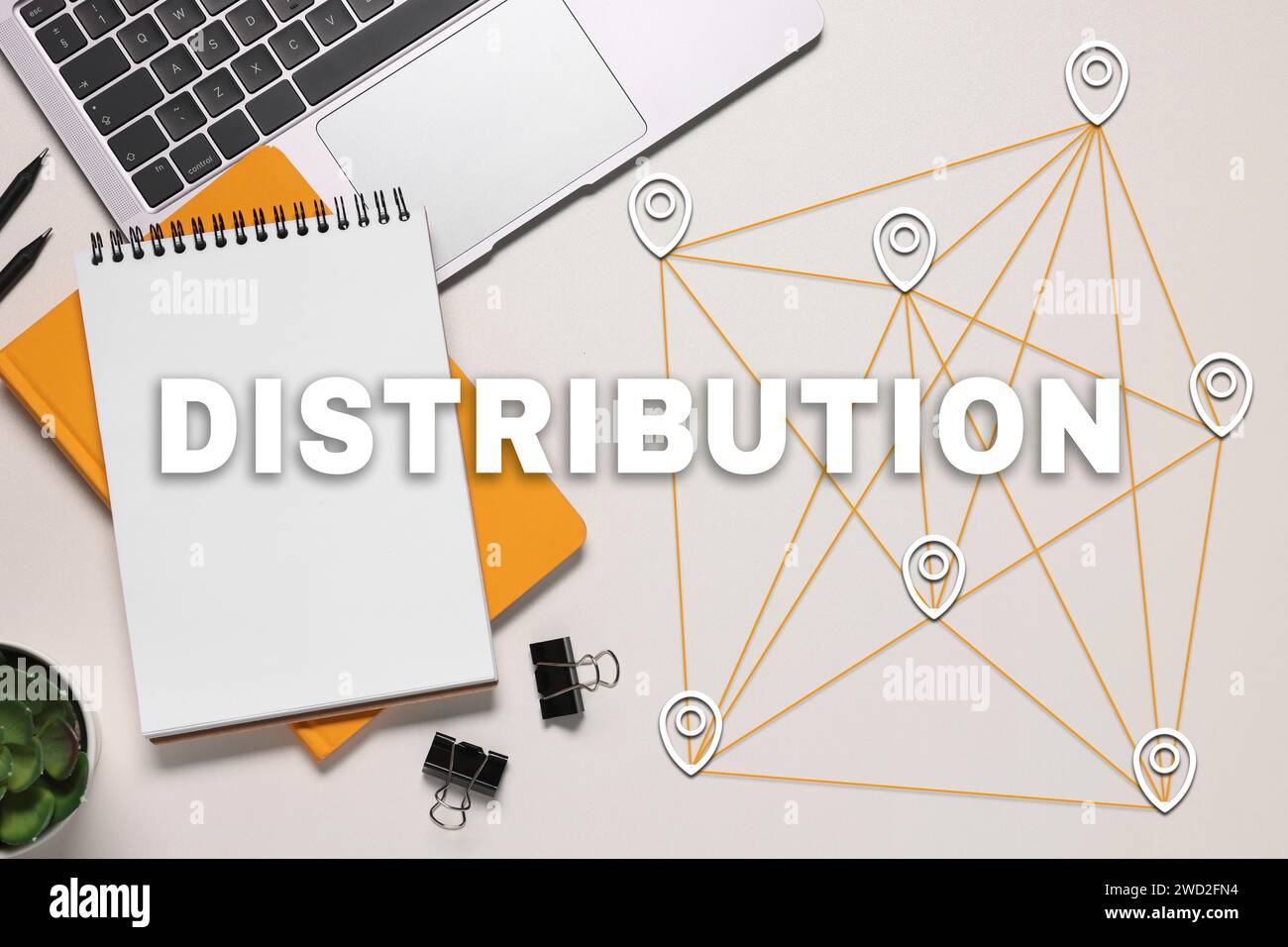 Distribution. Laptop and different stationery on white desk, flat lay ...