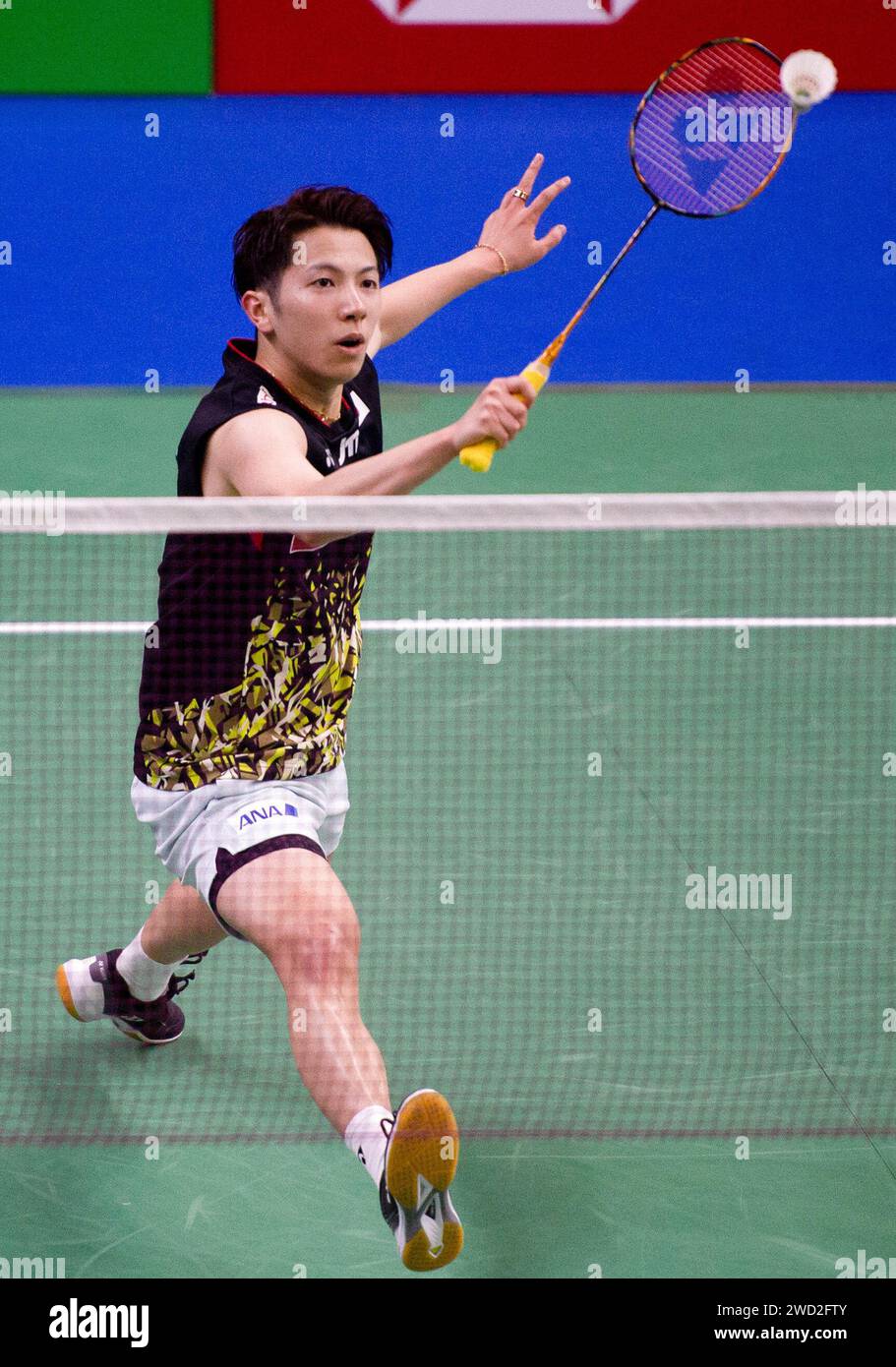 New Delhi, India. 18th Jan, 2024. Watanabe Koki of Japan returns a shot during the men's singles ...