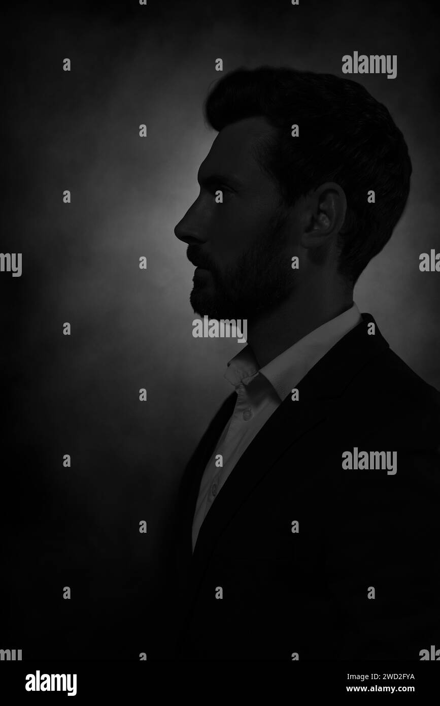 Silhouette of man in darkness. Portrait on black background Stock Photo ...