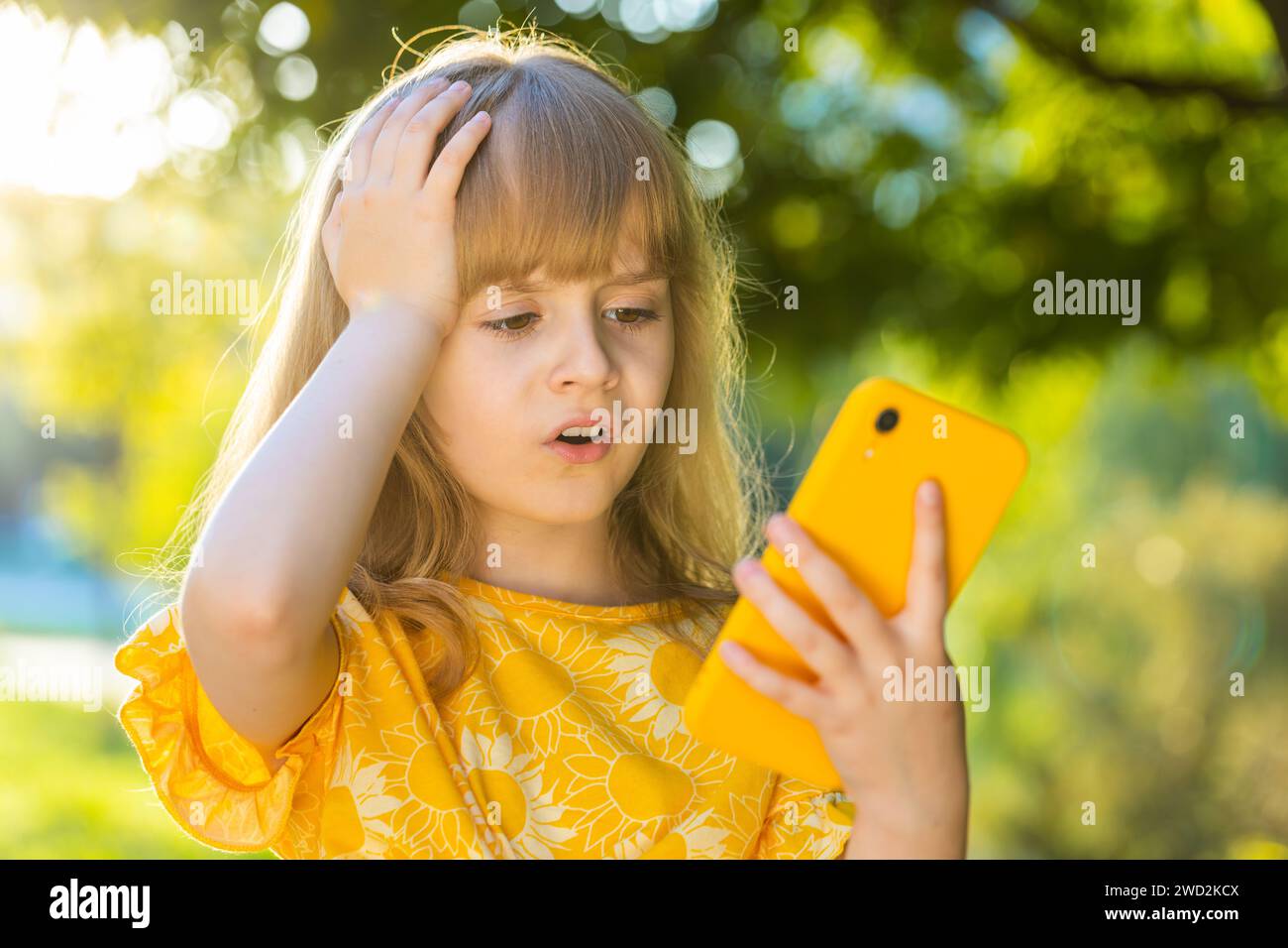 Preteen child kid play online game use smartphone typing browsing ...