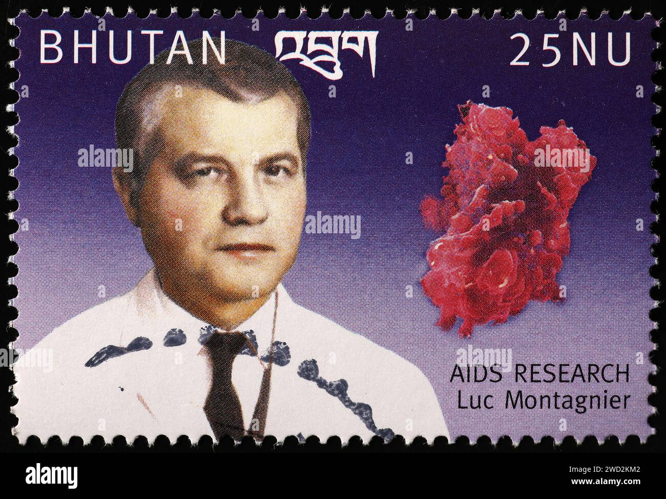 Discoverer of the HIV virus Luc Montagnier on stamp Stock Photo - Alamy