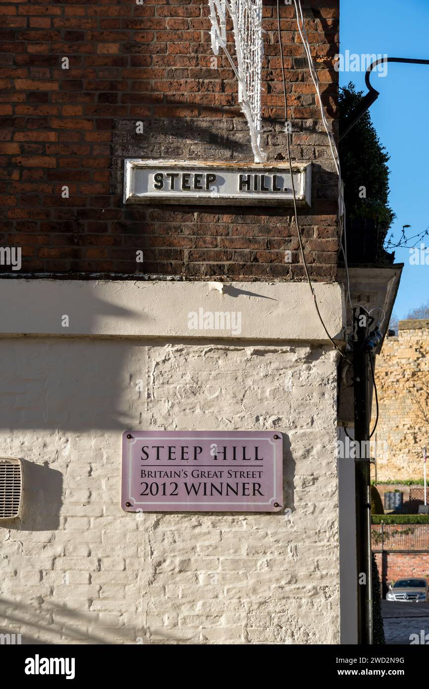 Steep Hill award sign on wall under Steep Hill road sign, Steep Hill ...