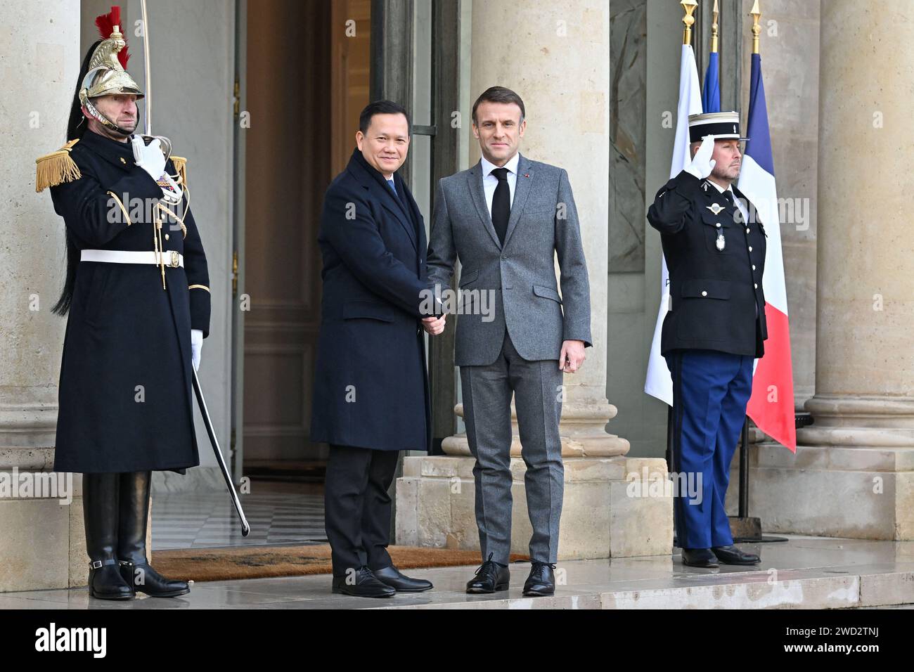 Paris, France. 18th Jan, 2024. French President Emmanuel Macron greets ...