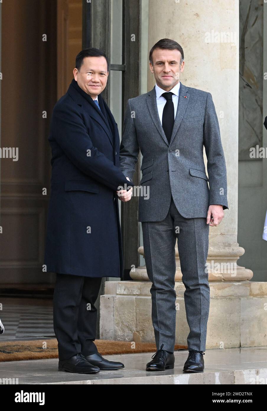 Paris, France. 18th Jan, 2024. French President Emmanuel Macron greets ...