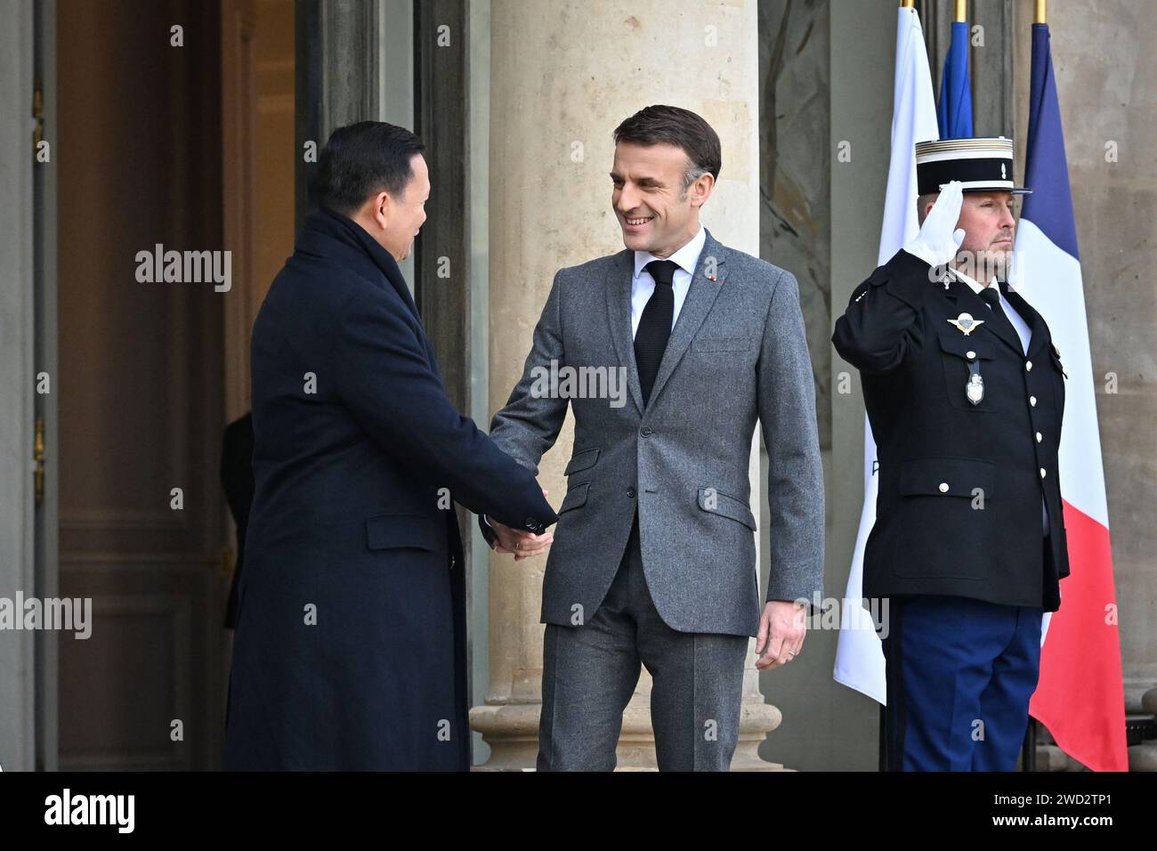 Paris, France. 18th Jan, 2024. French President Emmanuel Macron greets ...