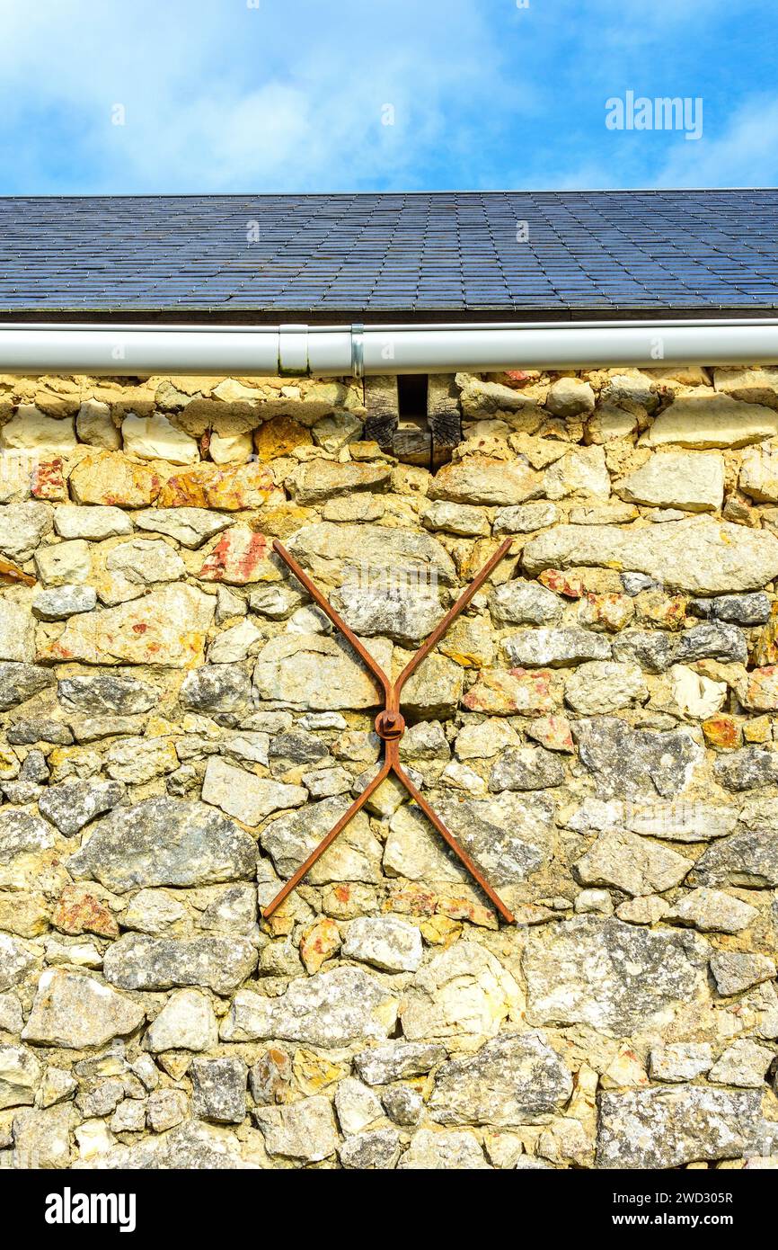 Newly fixed iron cross retainer to support old bunging stone wall ...