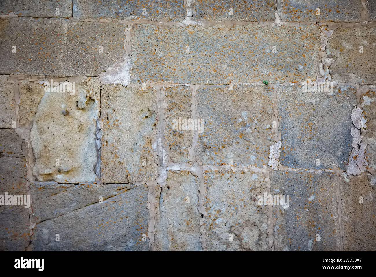 Background old wall made of porous stones of the mountainous area. Wall ...