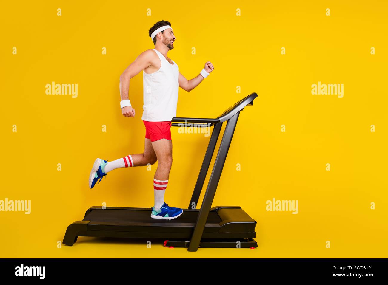 Full size profile photo of determined positive person running treadmill ...