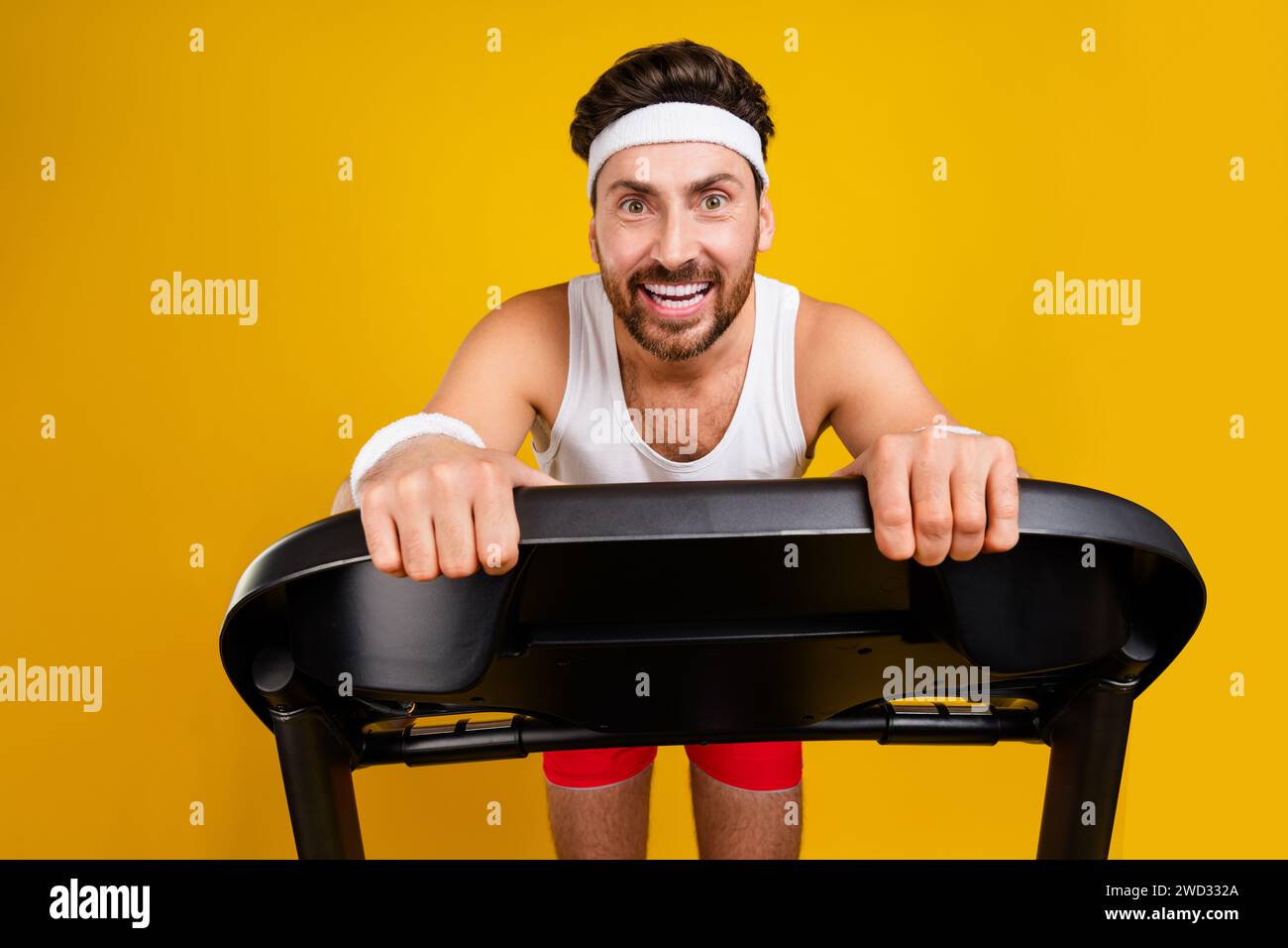 Photo of funky excited guy activewear having treadmill cardio training ...