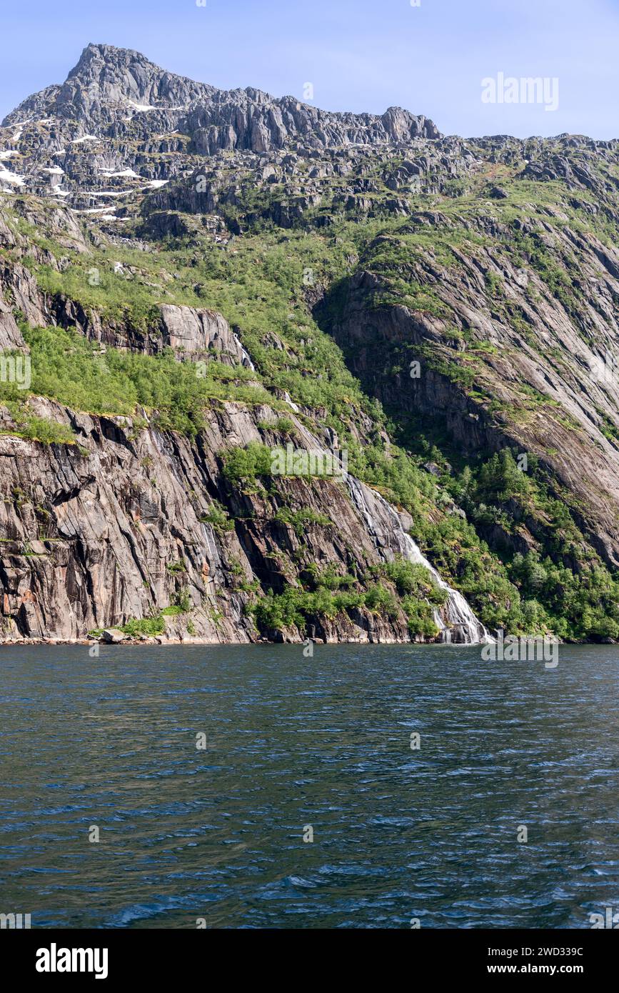 Vertical shot capturing a water cascade making its way through the ...