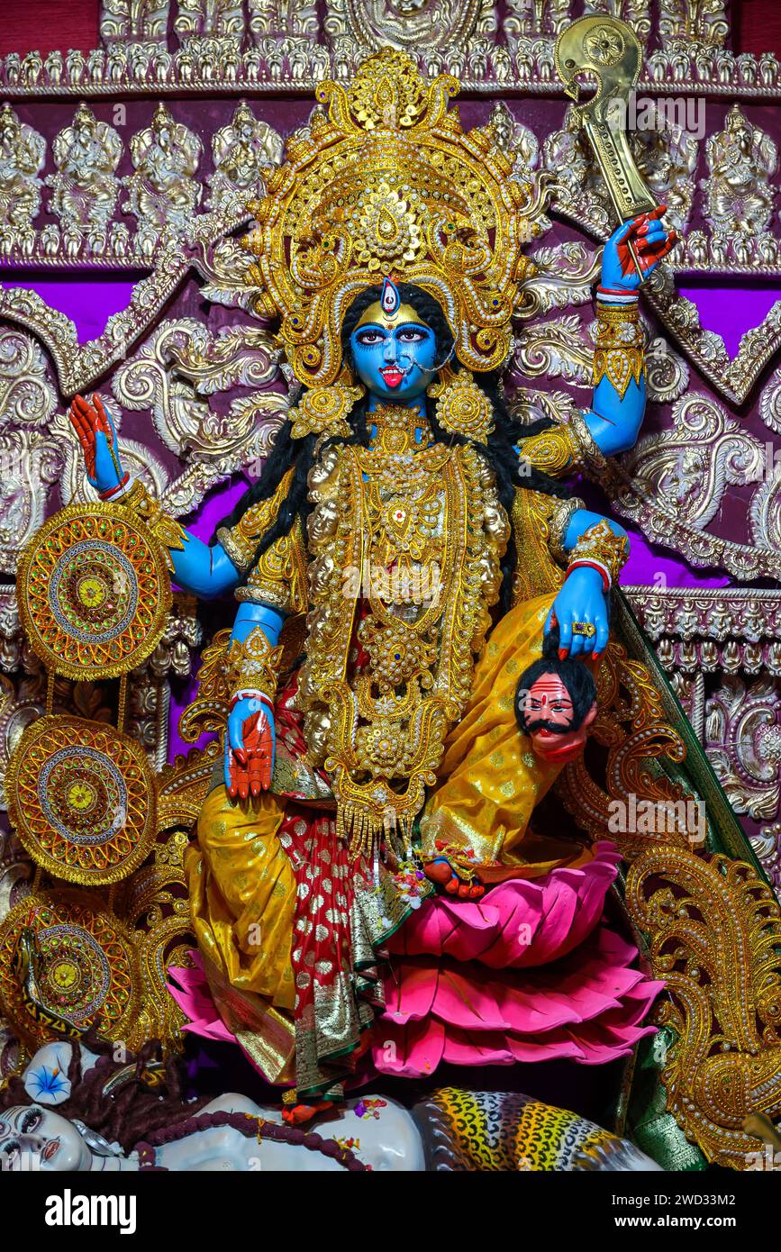 Idol of Goddess Maa Kali at a decorated puja pandal in Kolkata, West Bengal, India. Kali puja ...