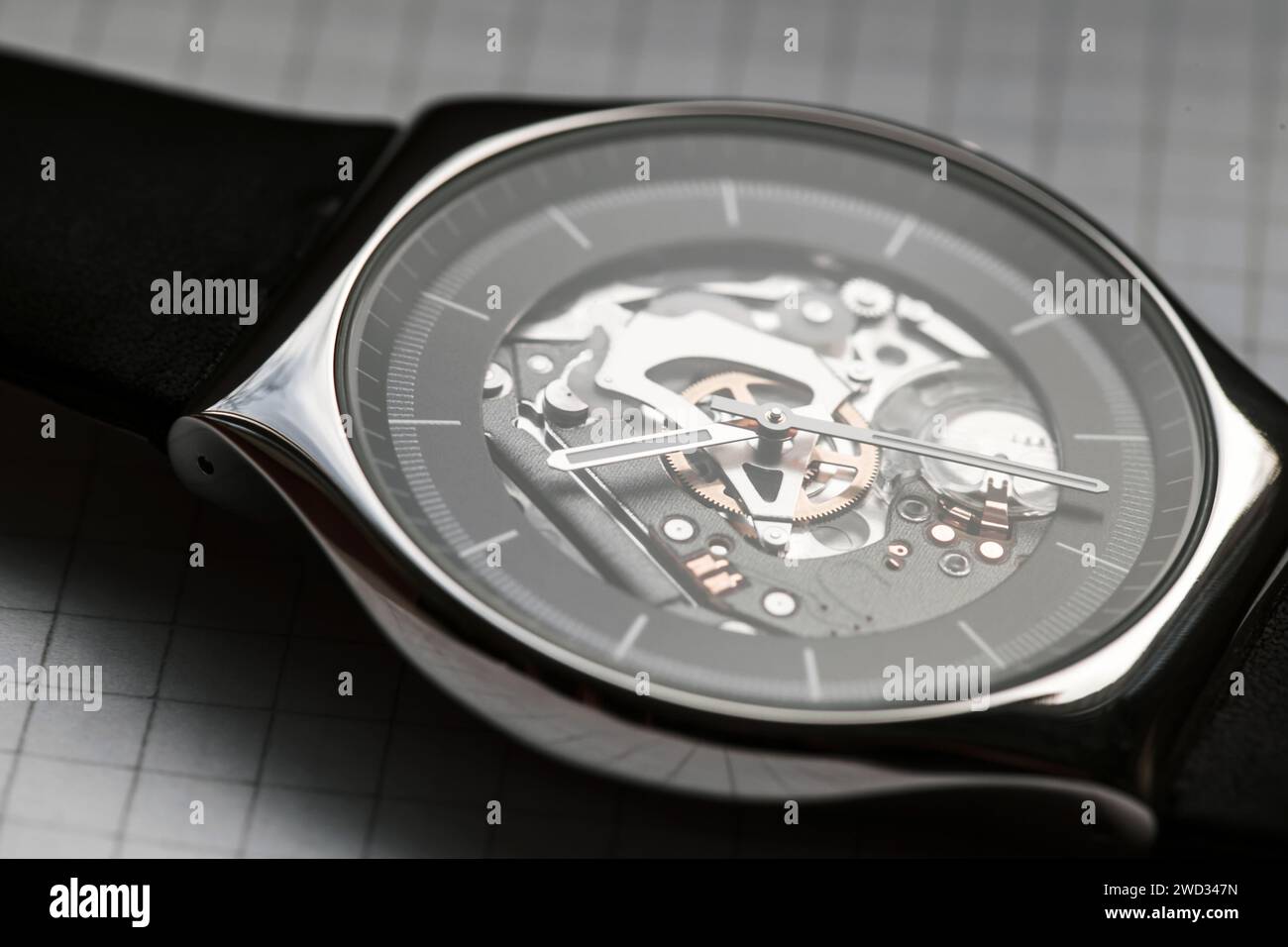 Macro photo of quartz black skeleton wrist watch, selective soft focus ...
